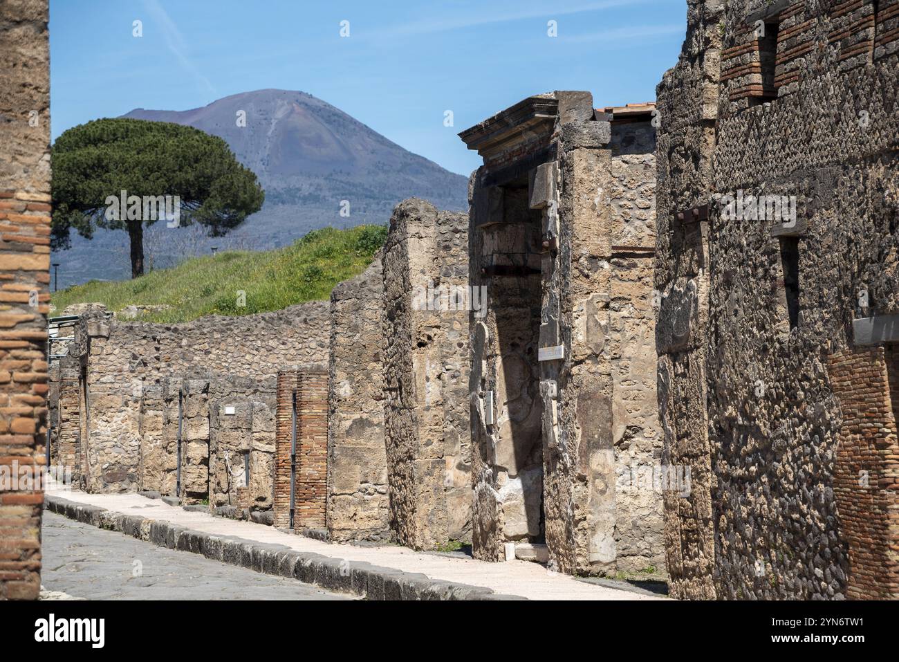 POMPEII, ITALY, MAY 04, 2022, A crosswalk of a typical Roman road in ...