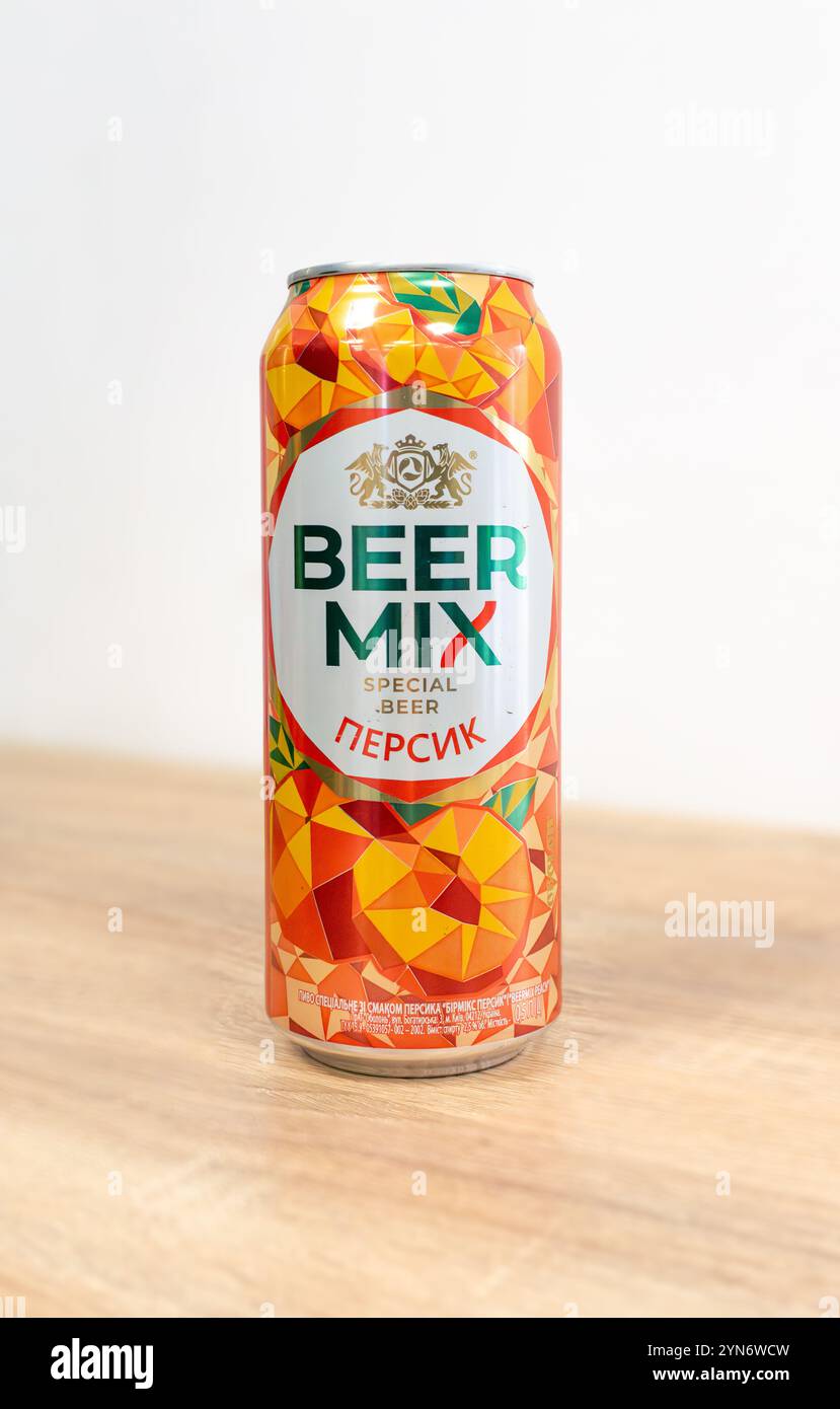 Kiev, Ukraine - November 23, 2024: Can 0,5 Beer Mix drink Peach flavor ...
