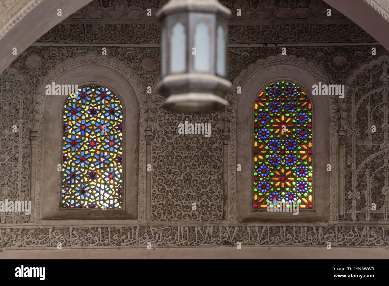 Two traditionally colored windows at a religious building in Marrakech ...