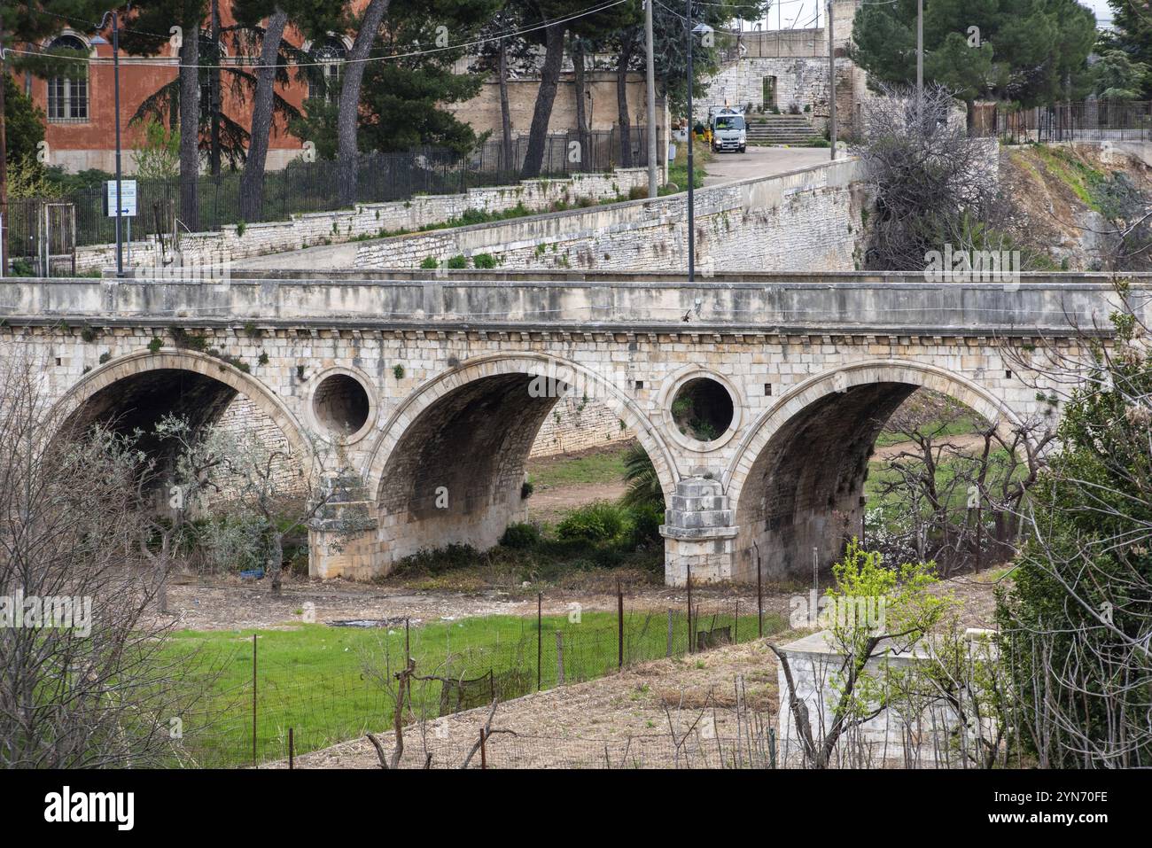 Beautiful old bridge with three arches in downtown bitonto hi-res stock ...
