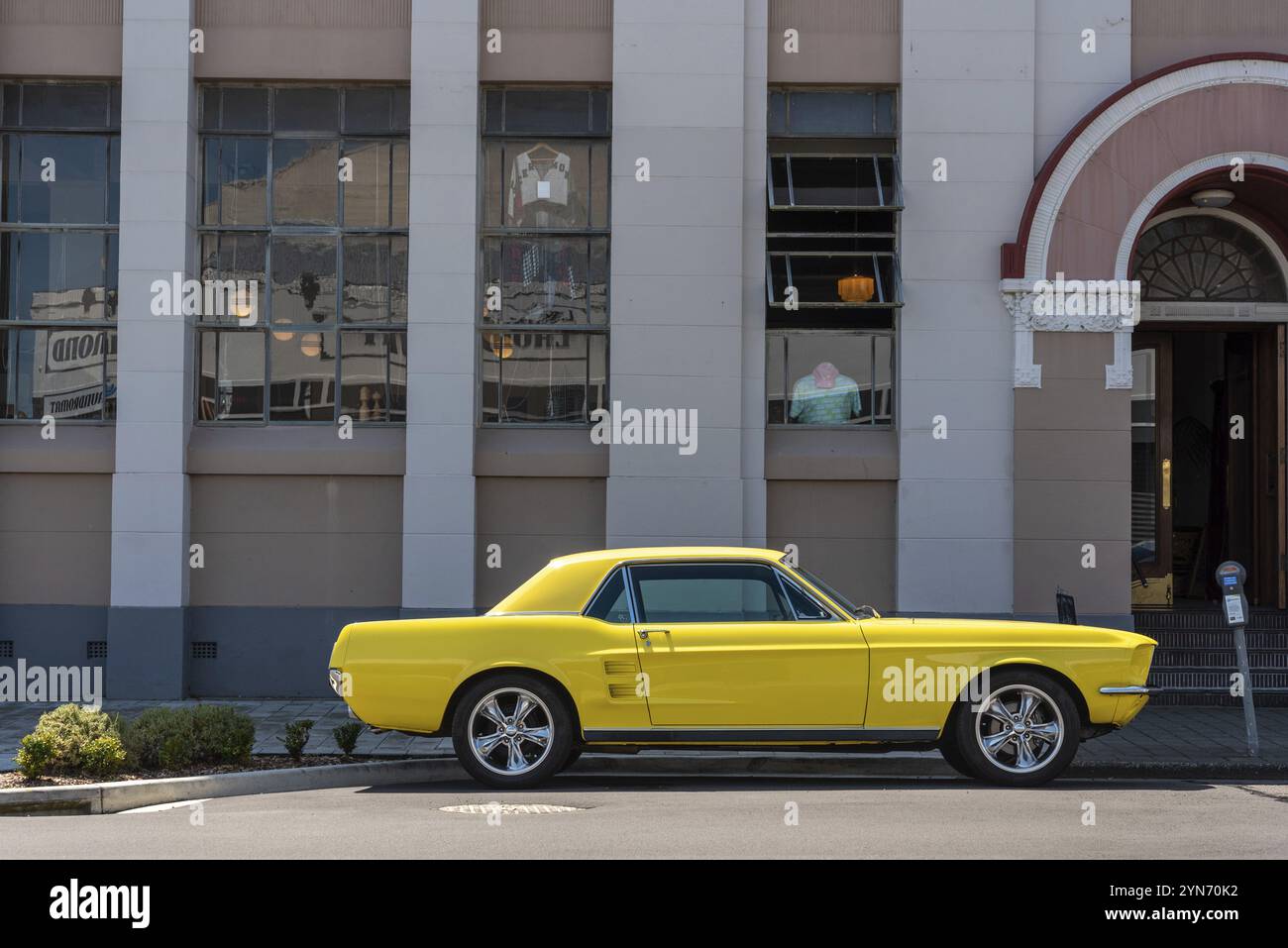 Vintage car parking in front of an Art Deco building in downtown Napier, North Island of New ...
