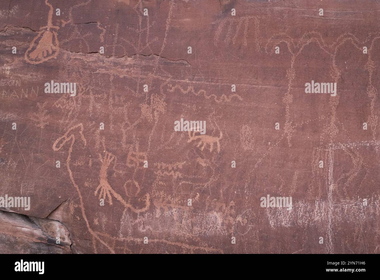 Historic petroglyphs from native Americans on Atlatl Rock in the Valley ...