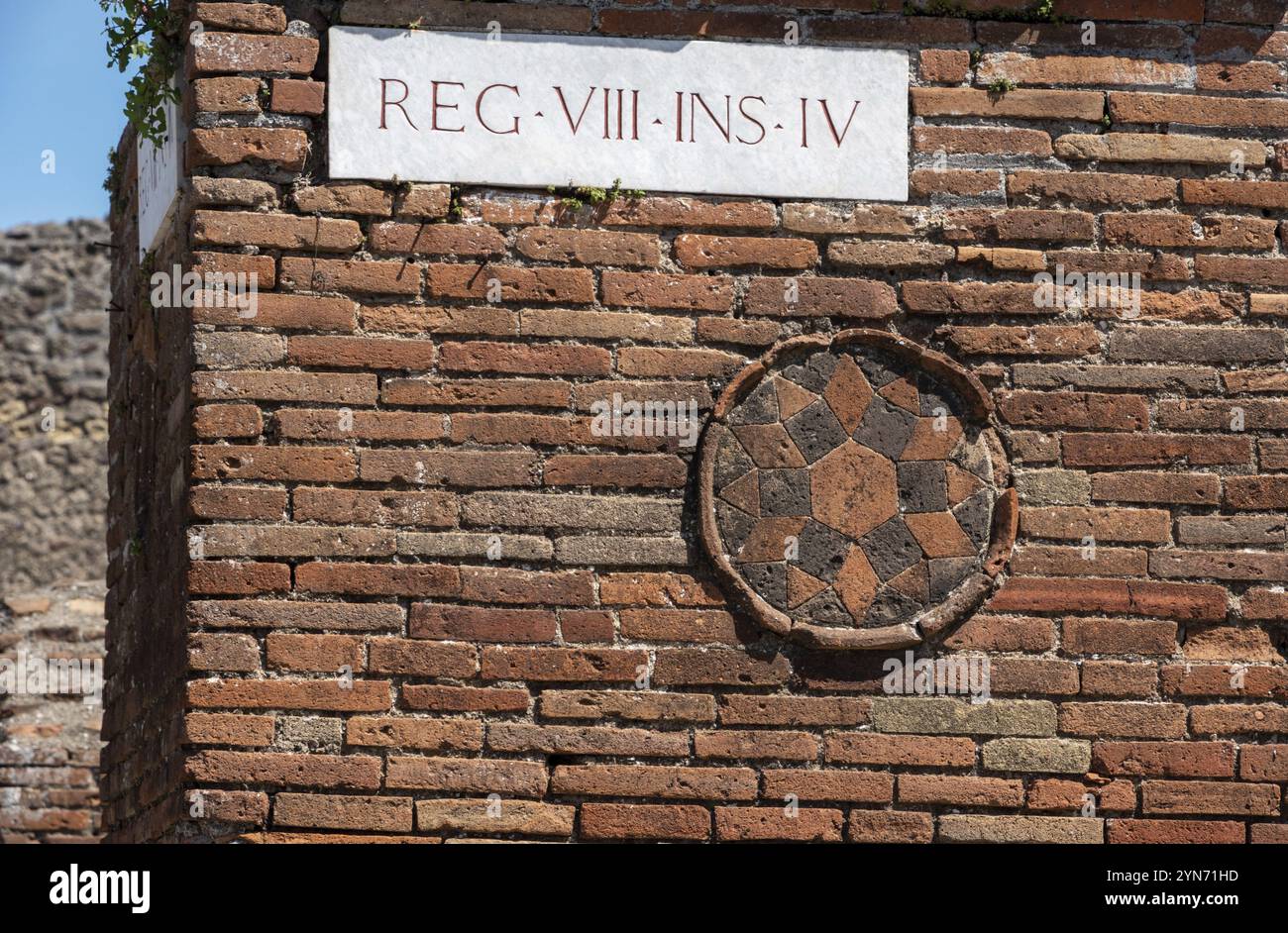 POMPEII, ITALY, MAY 04, 2022, Sign with the street's name in ancient ...