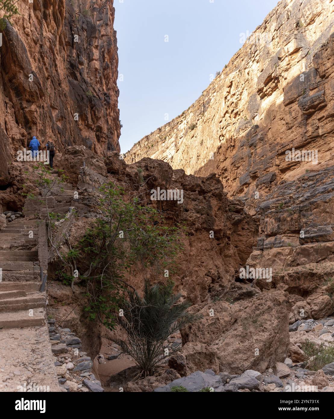 Hiking through the iconic Amtoudi canyon in the Anti-Atlas, Morocco ...