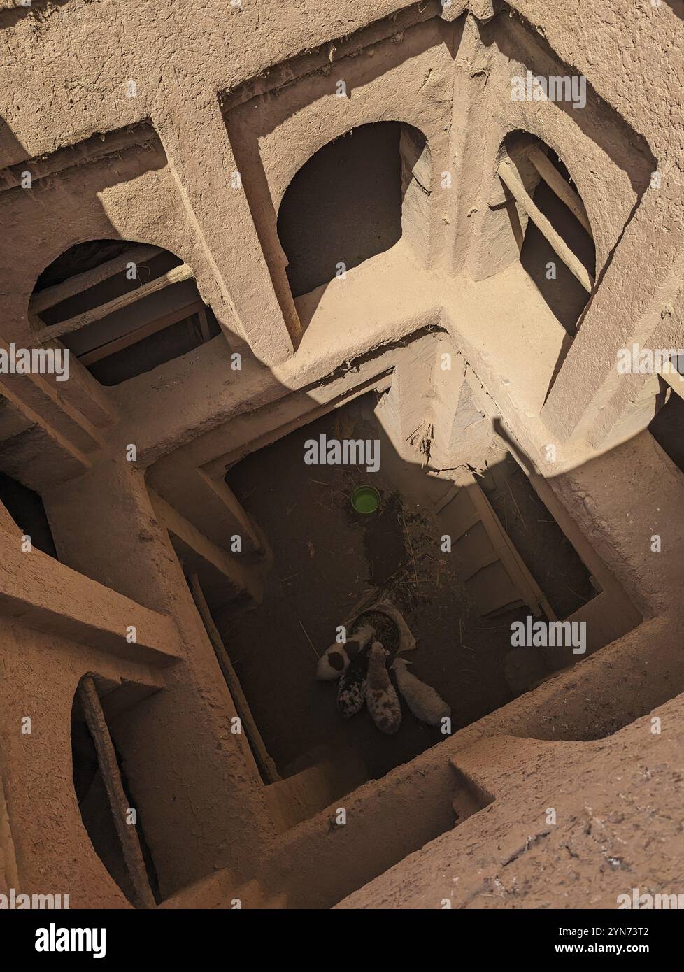 View into an inner courtyard of an old, big, derelict berber house ...