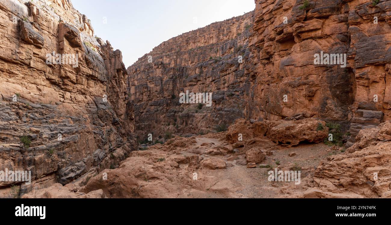 Hiking through the iconic Amtoudi canyon in the Anti-Atlas, Morocco ...