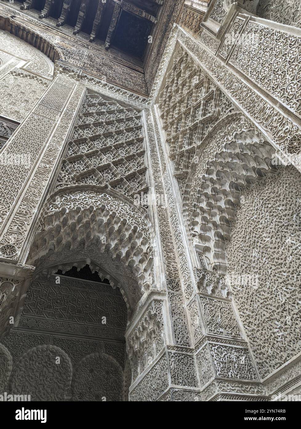 Beautiful ornate relief at a facade of a madrasa in Fes, a Koran school ...