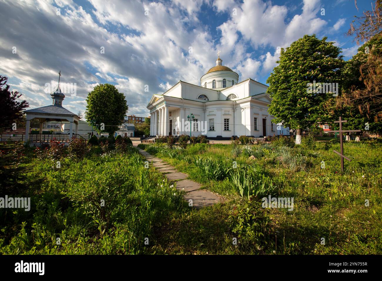 A scenic view of historic churche surrounded by greenery under a ...