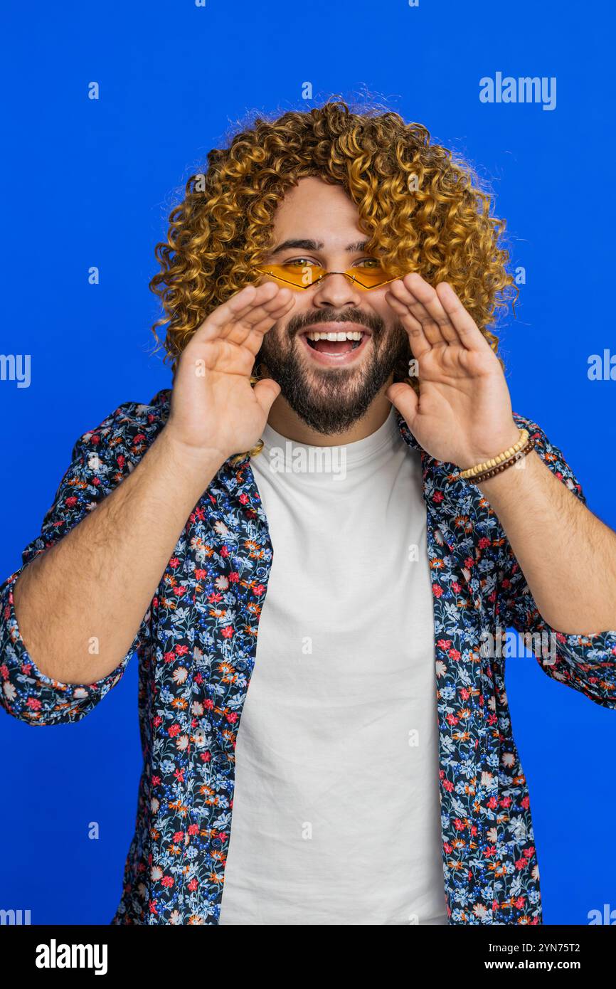 Happy excited man yell, shout to camera, promotion advertisement of ...