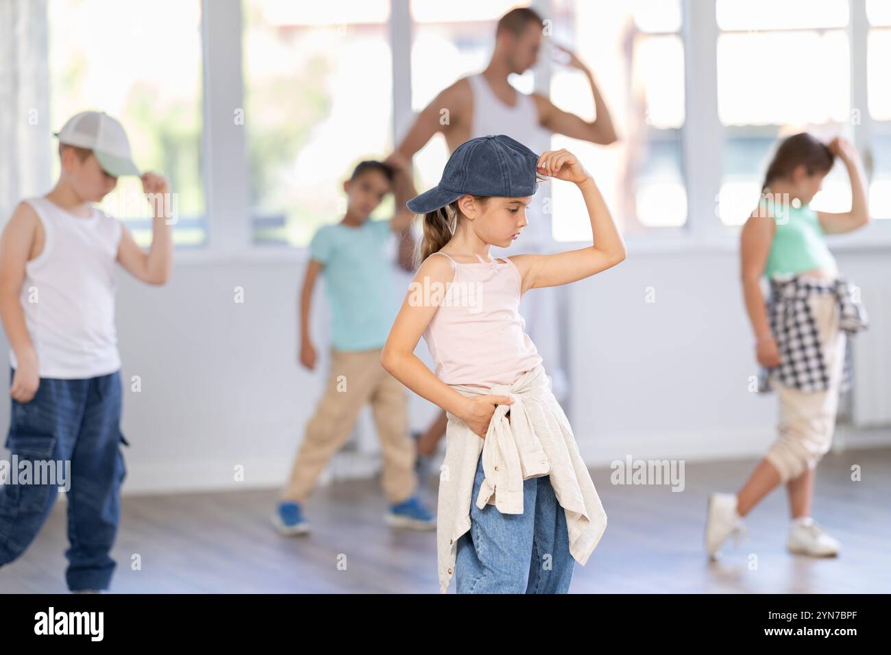 Tween girl mastering krump dance in children dance studio Stock Photo ...
