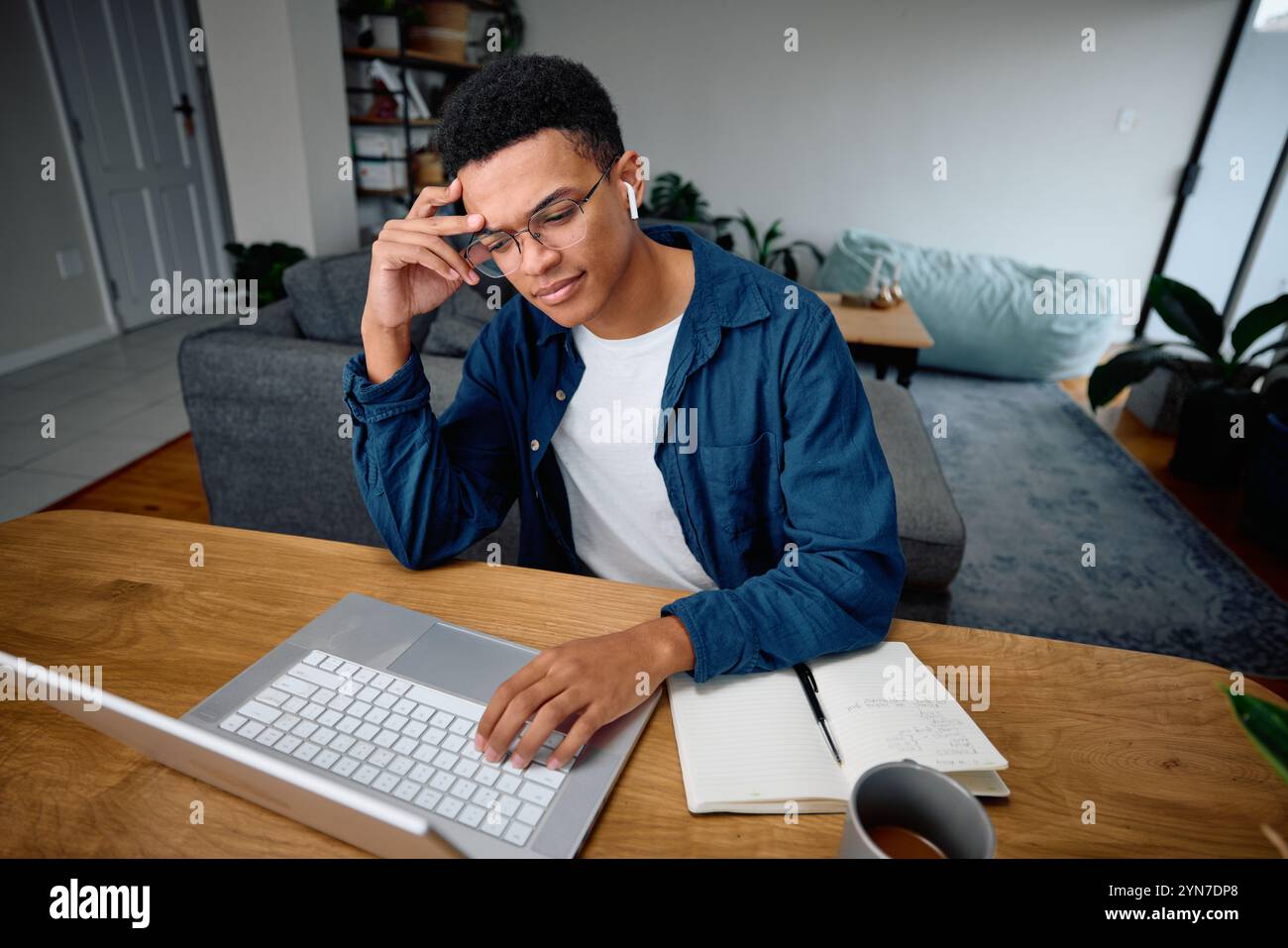 African American man struggling to understand the work he is learning ...