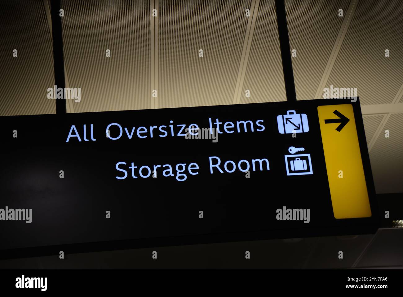 Airport signage for oversize bags and storage Stock Photo - Alamy