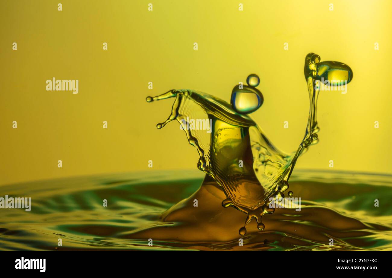 Arresting ethereal colour infused imaginative water collision macro ...