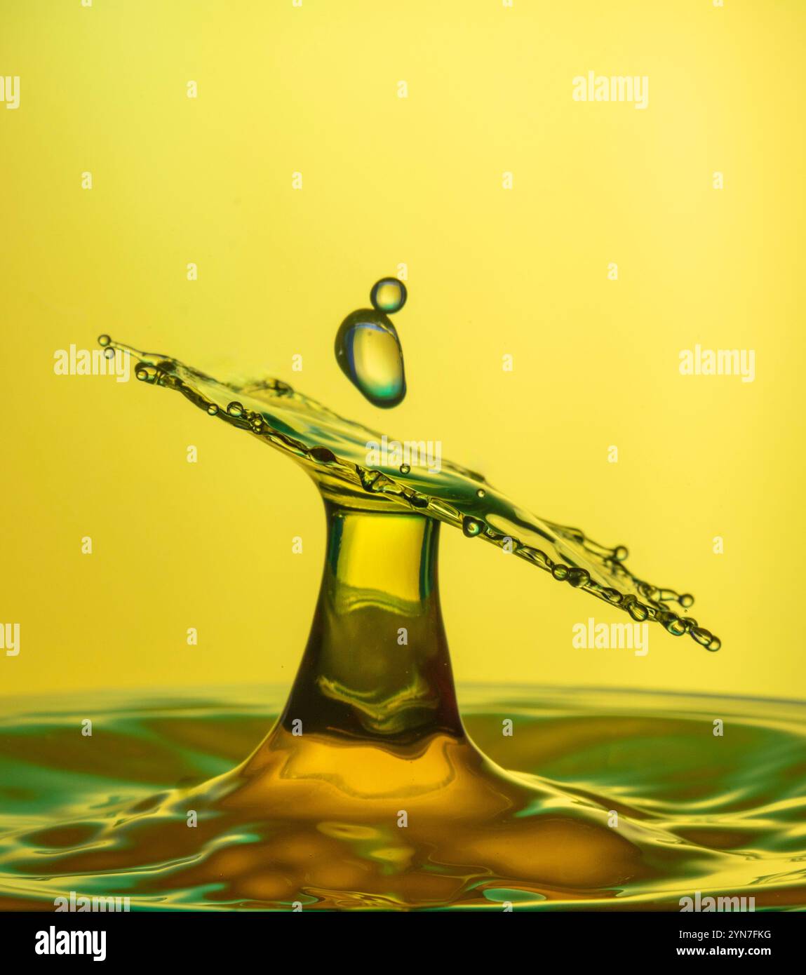 Arresting ethereal colour infused imaginative water collision macro ...