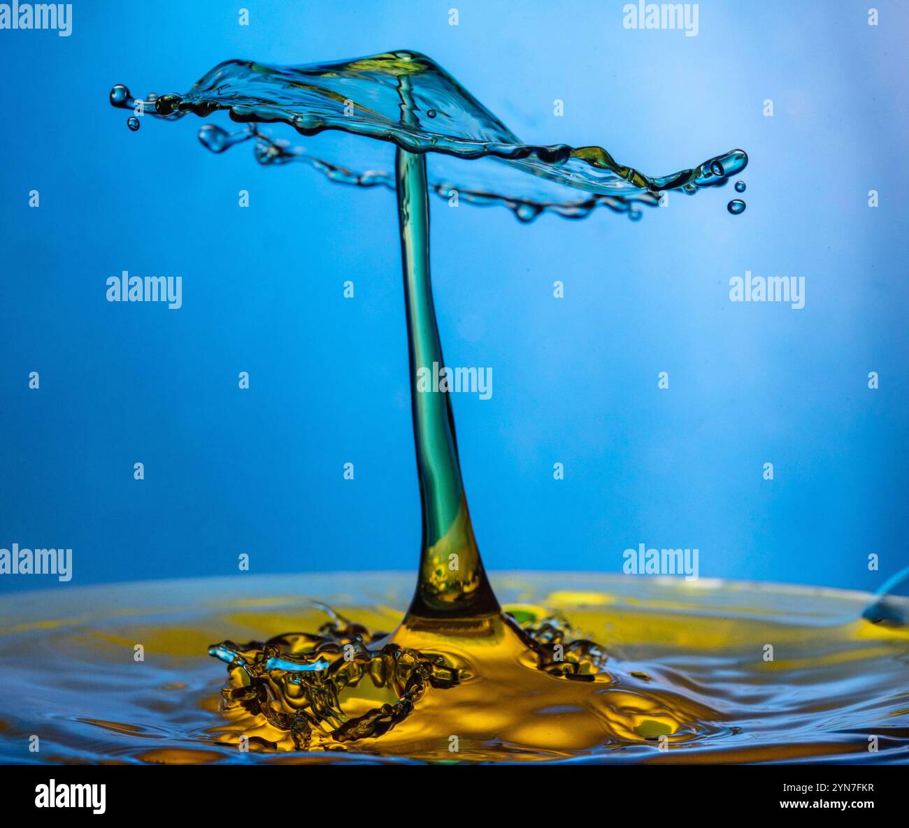 Arresting ethereal colour infused imaginative water collision macro ...