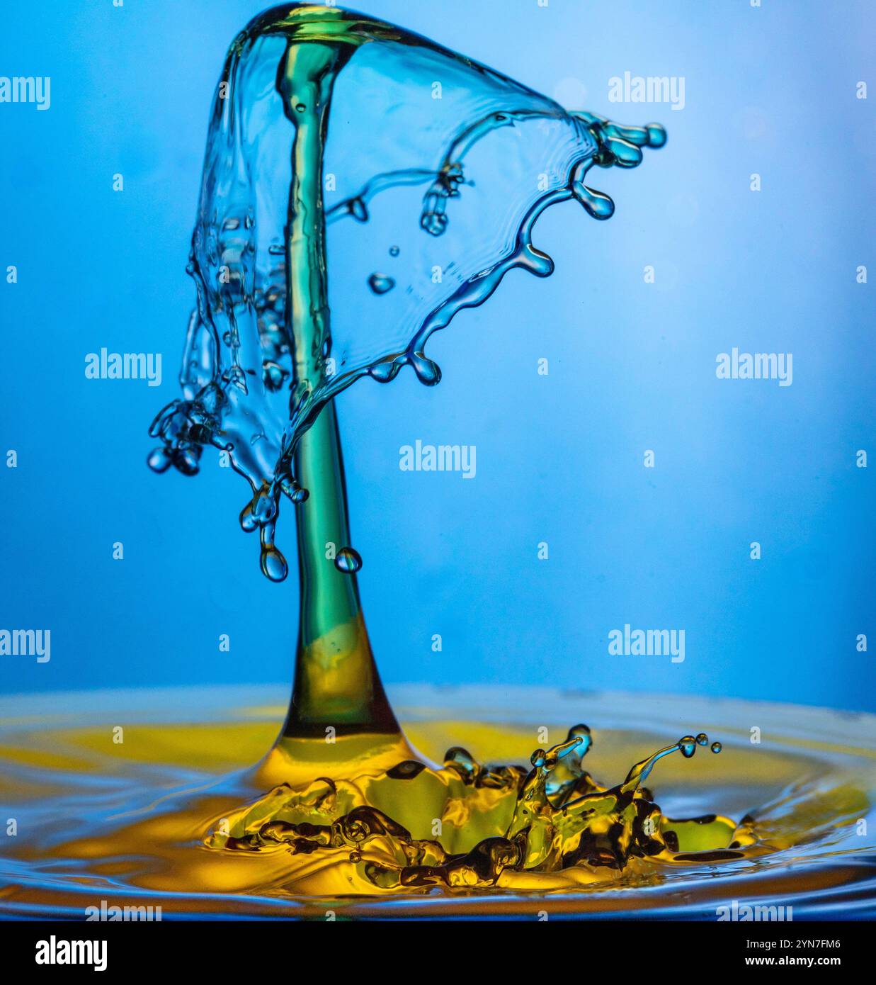 Arresting ethereal colour infused imaginative water collision macro ...