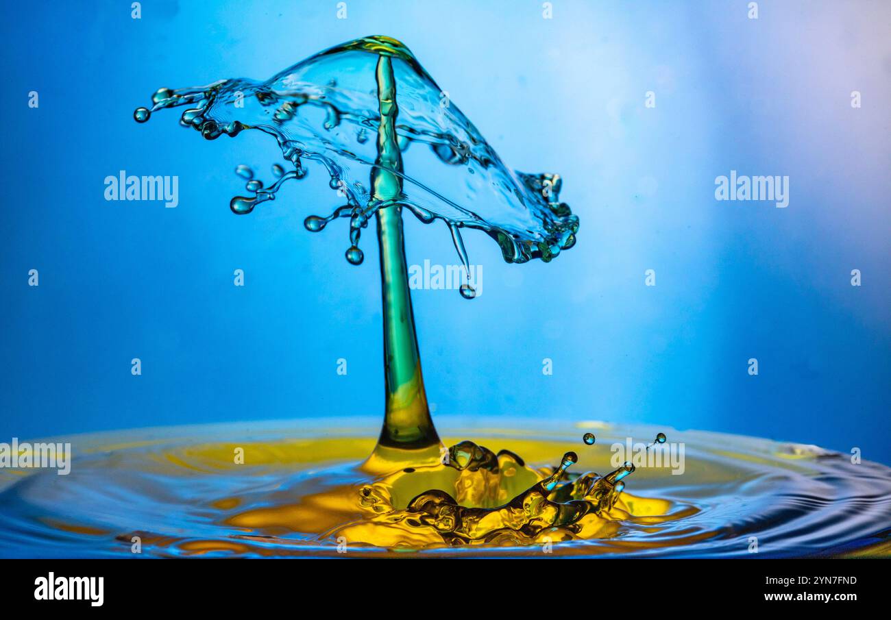 Arresting ethereal colour infused imaginative water collision macro ...