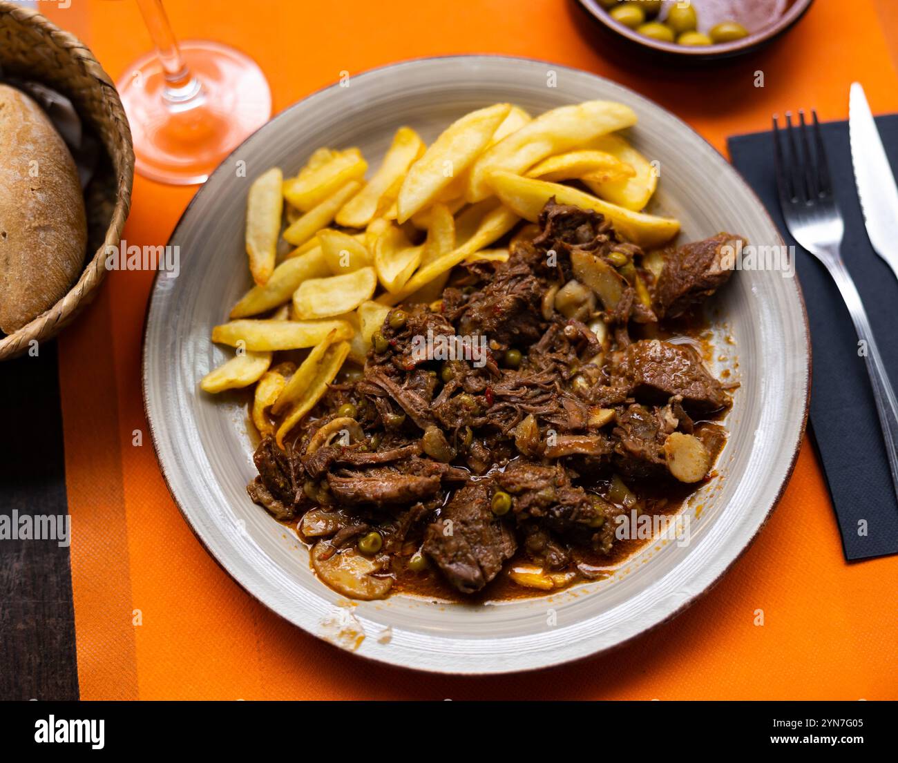 Beef stew served with stewed vegetables Stock Photo - Alamy
