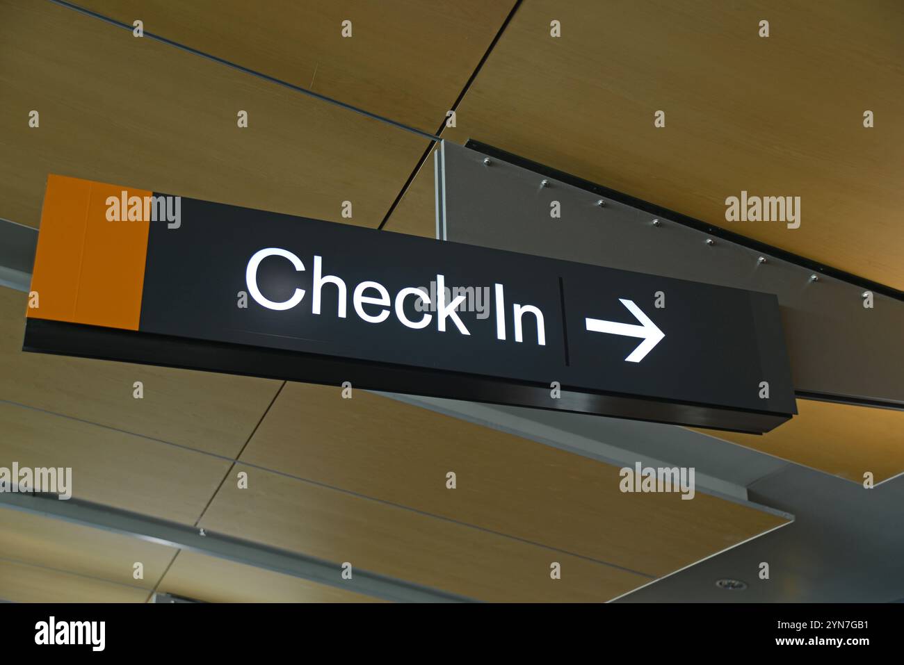 Airport signage for the exit to buses and taxis Stock Photo - Alamy