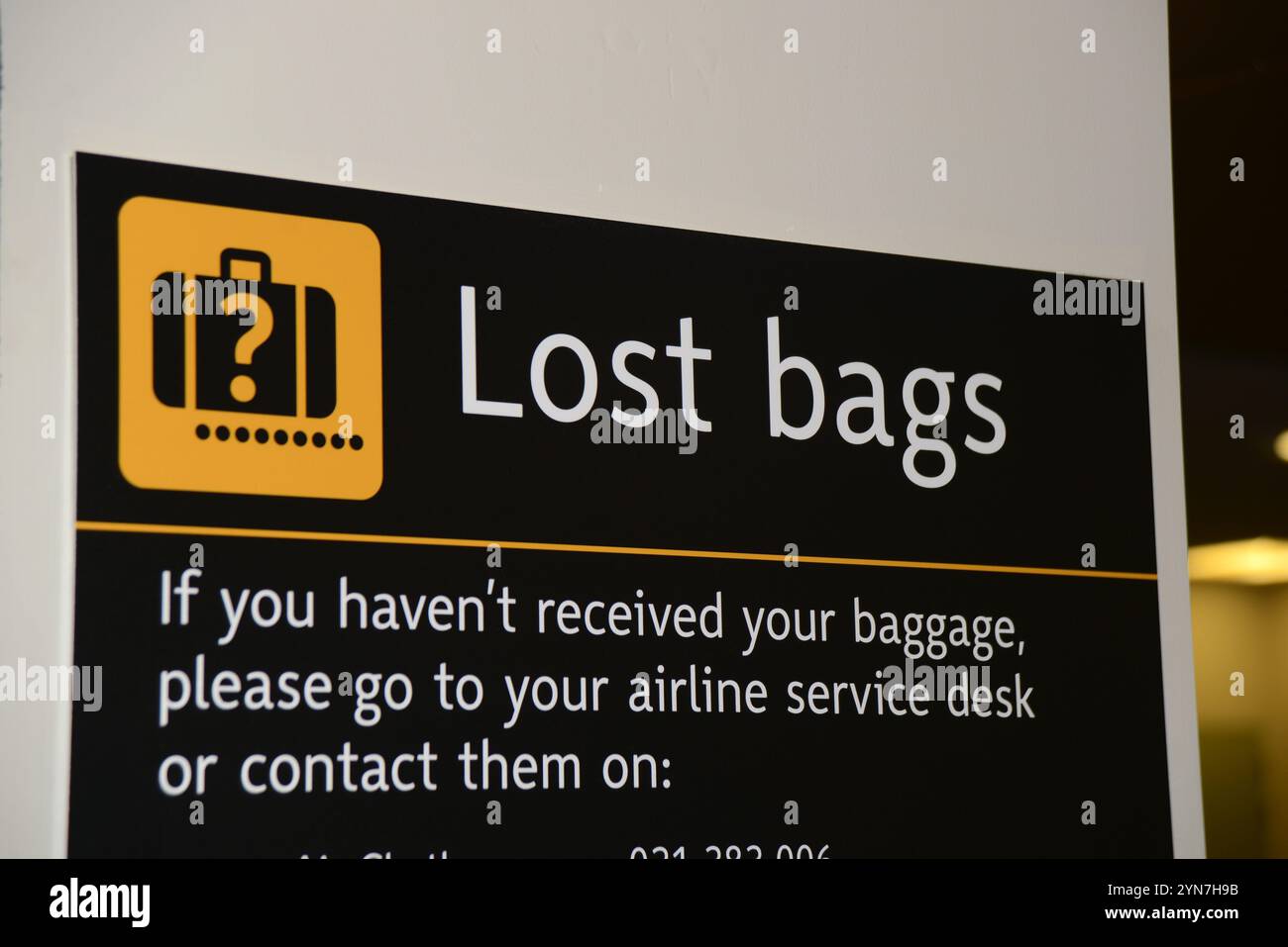 Airport signage for lost bags Stock Photo - Alamy