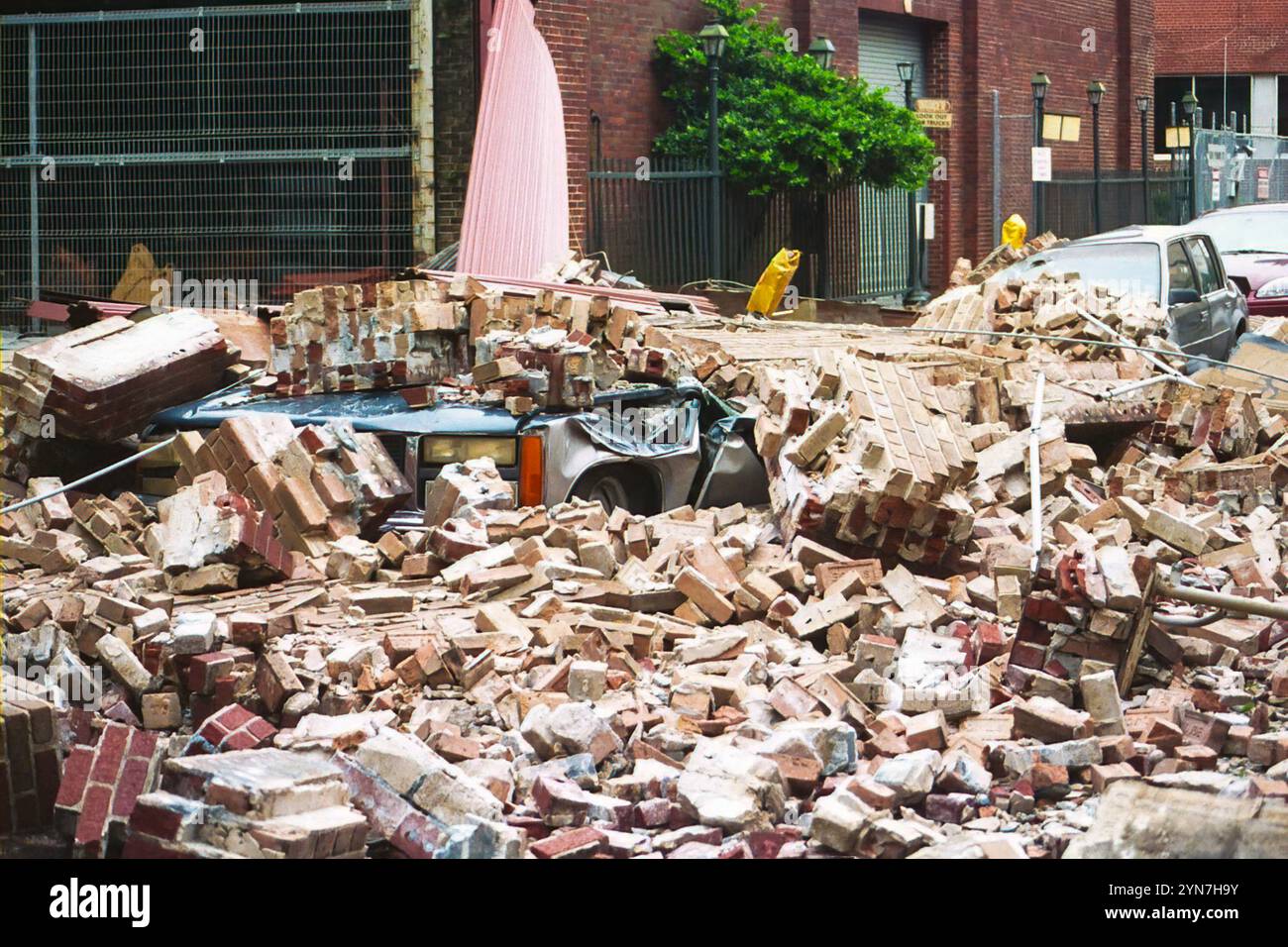New Orleans, LA, USA - August 29, 2005: Car covered with bricks from a ...