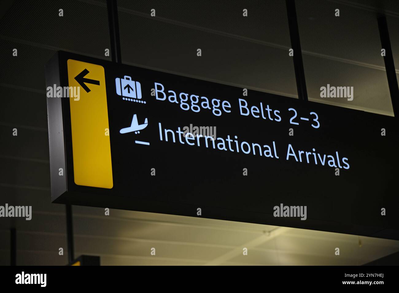 Airport signage for Baggage Belts 2-3 and international arrivals Stock ...