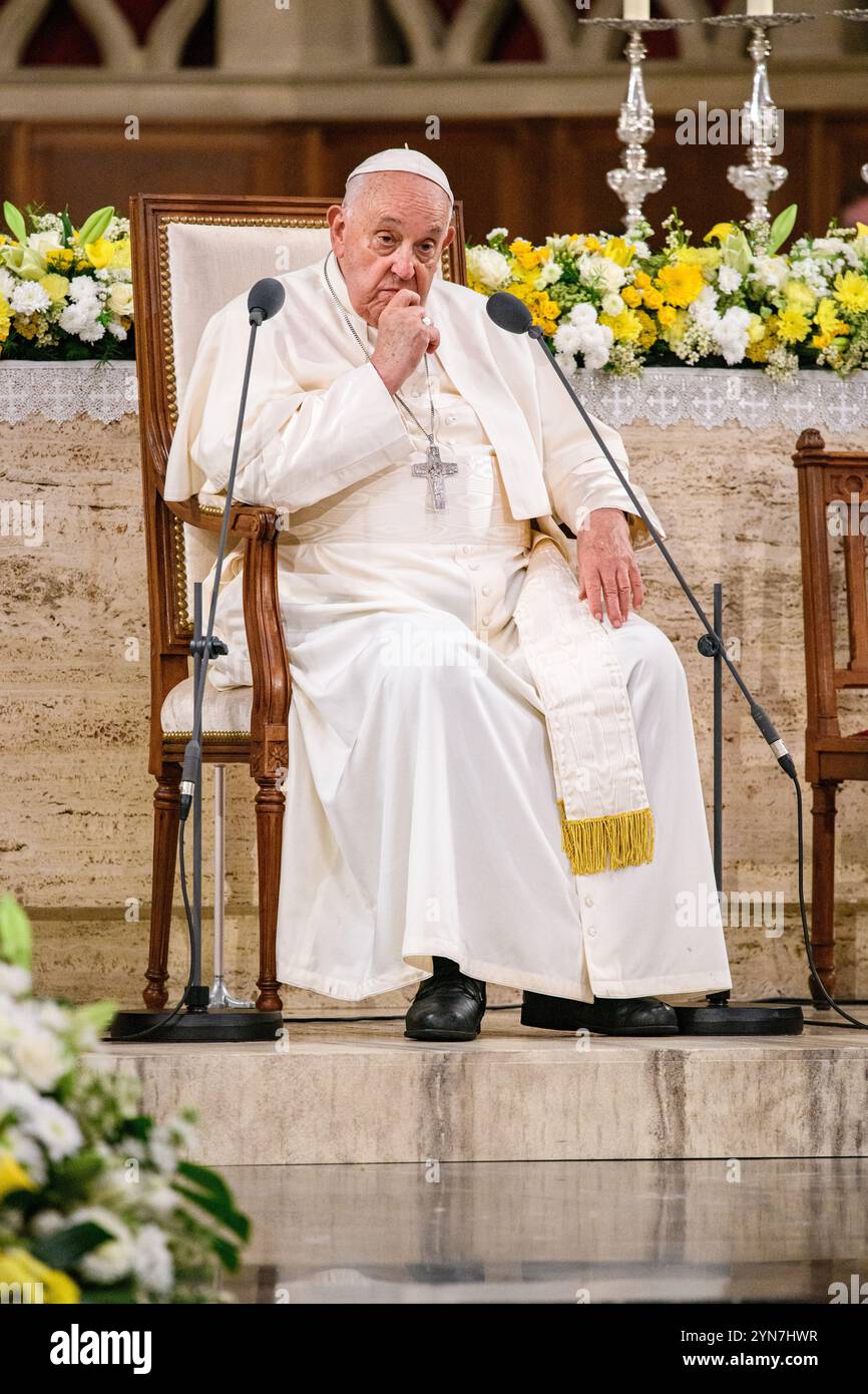 Pope Francis listening. The Pope's meeting with the catholic community ...