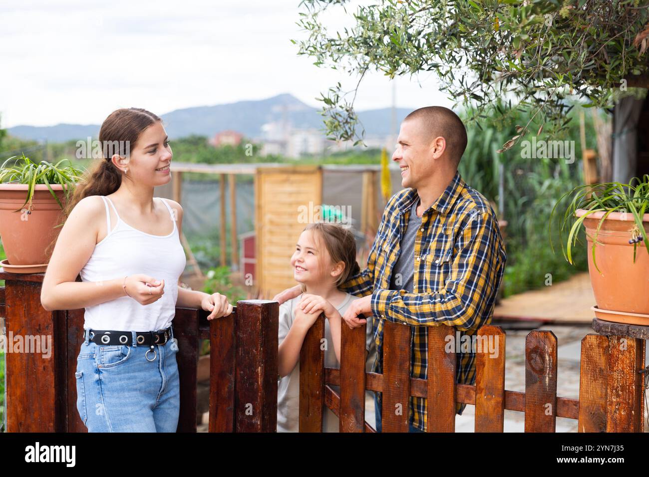 Getting to know the neighbors at country houses in village Stock Photo ...