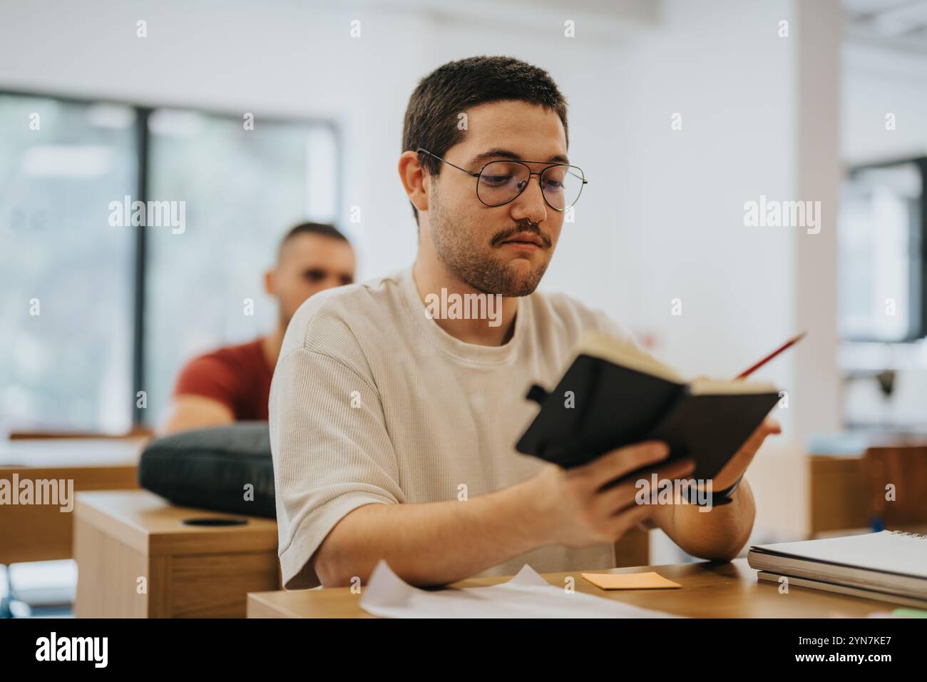 Focused high school students studying during a classroom lesson Stock ...