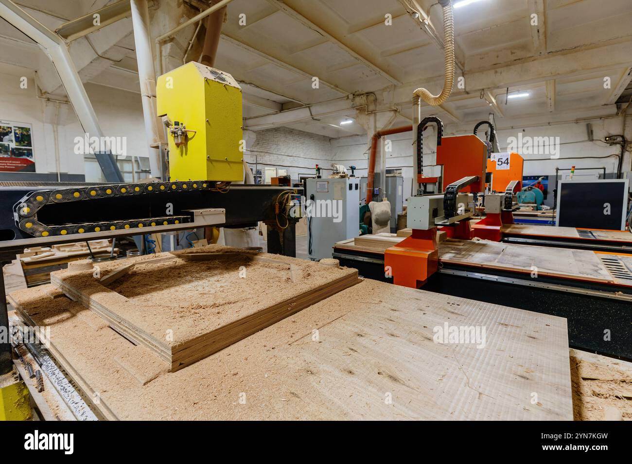 Woodworking workshop. Automated CNC drilling and milling machines Stock ...