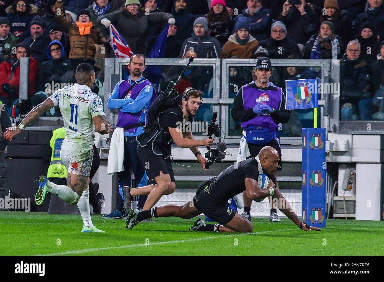 Mark Tele'a of New Zealand scores a try during the Autumn Nations ...