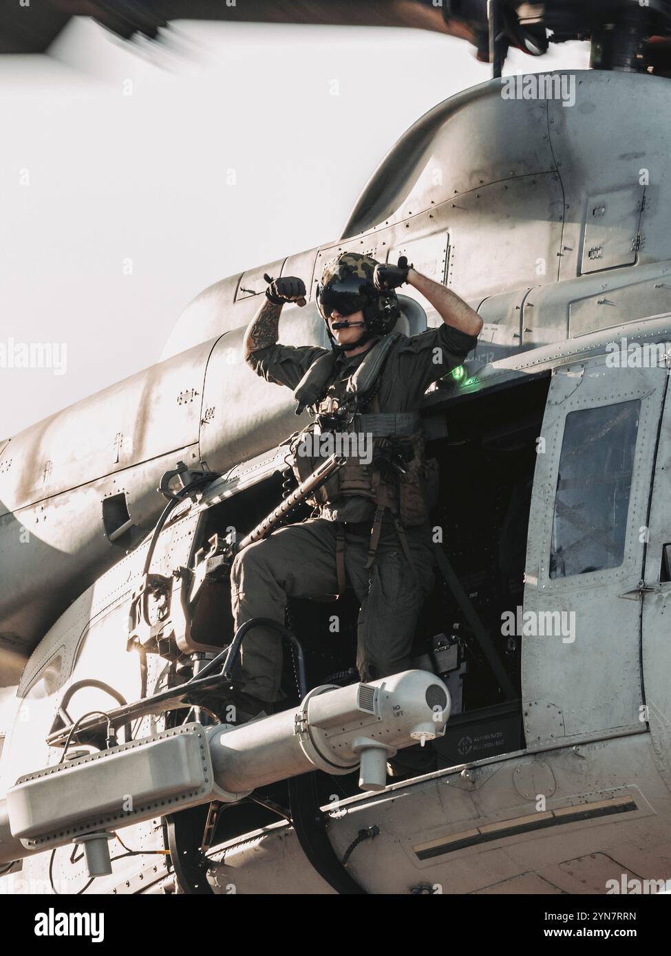 A U.S. Marine assigned to Marine Medium Tiltrotor Squadron (VMM) 165 ...