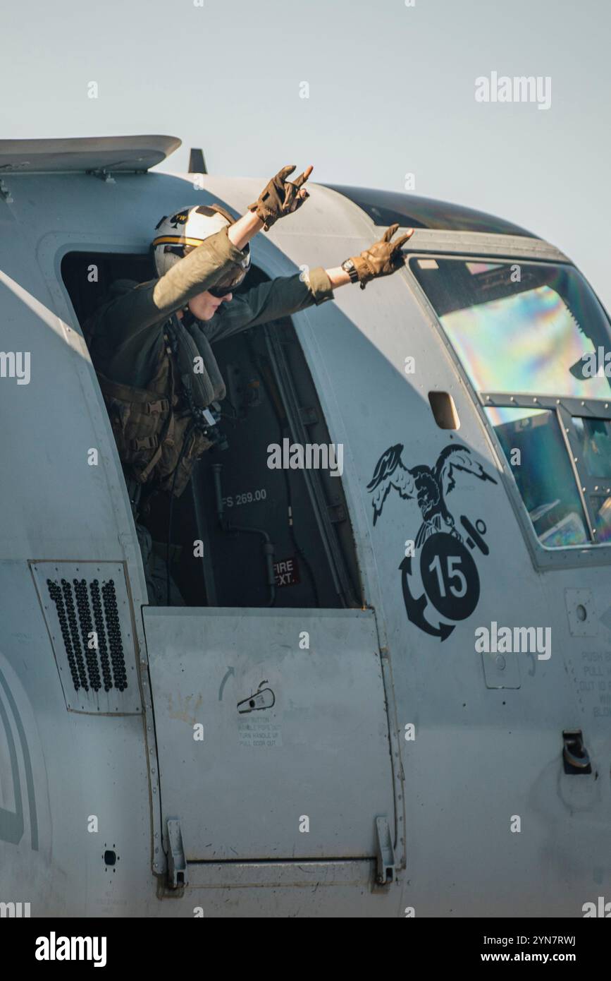 A U.S. Marine Corps MV-22B Osprey crew chief assigned to Marine Medium ...