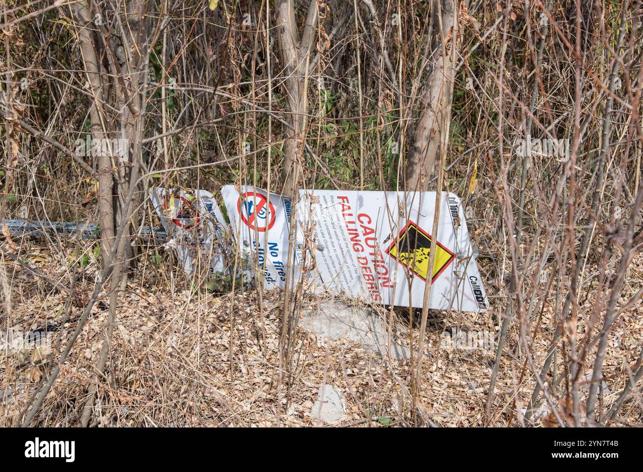 Broken caution falling debris sign on the beach at Bluffer's Park in ...