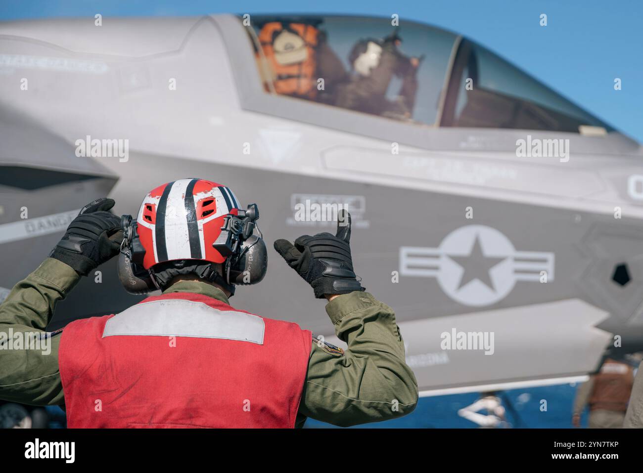 A U.S. Marine assigned to Marine Fighter Attack Squadron (VMFA) 225 ...