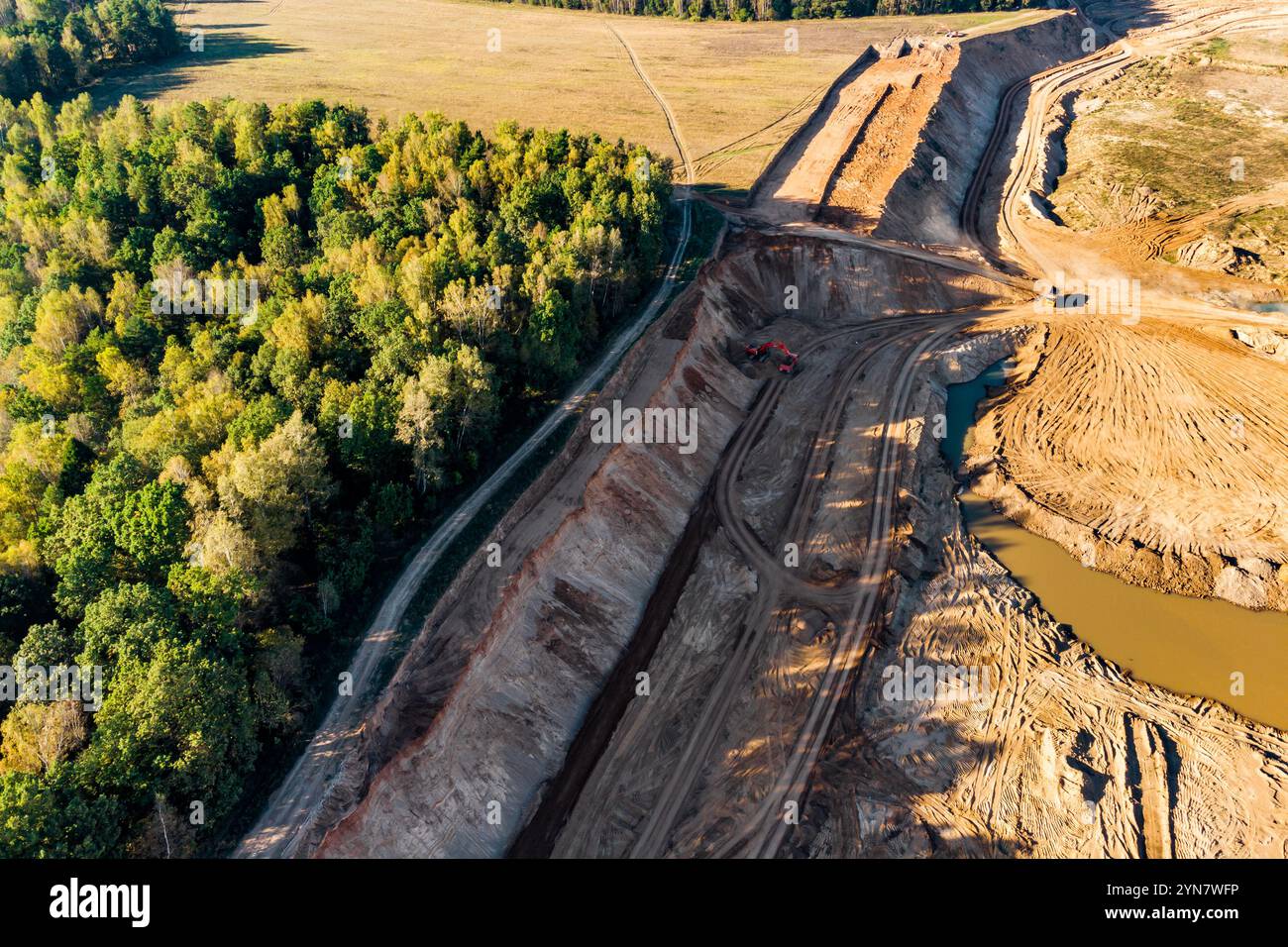 Bird's eye view of a sand quarry near a forest Stock Photo - Alamy