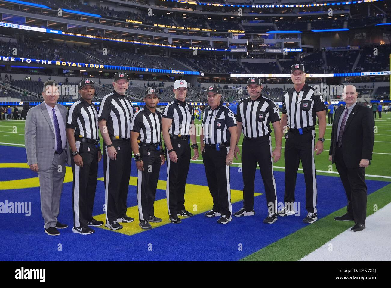 NFL officials Bob Hubbell, from left, poses with field judge Jabir ...