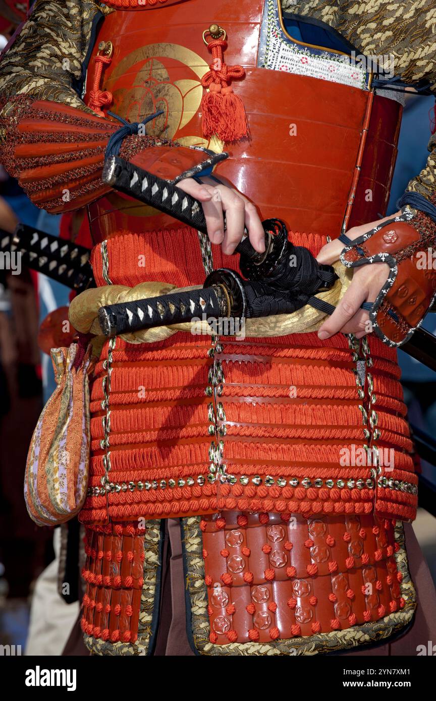 Samurai warrior holding a katana sword while in costume at the Hikone ...