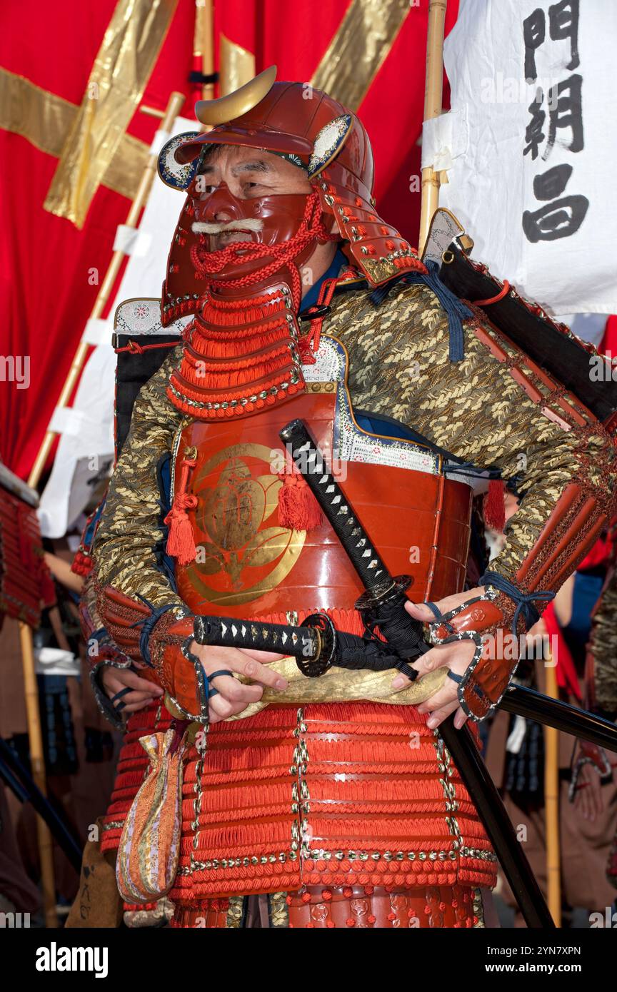 Samurai warrior holding a katana sword while in costume at the Hikone ...