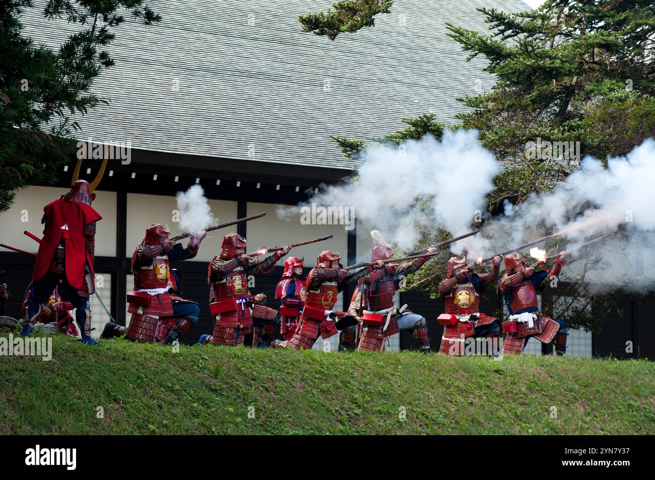 Samurai warriors in full armor costume firing muskets in the Hikone ...