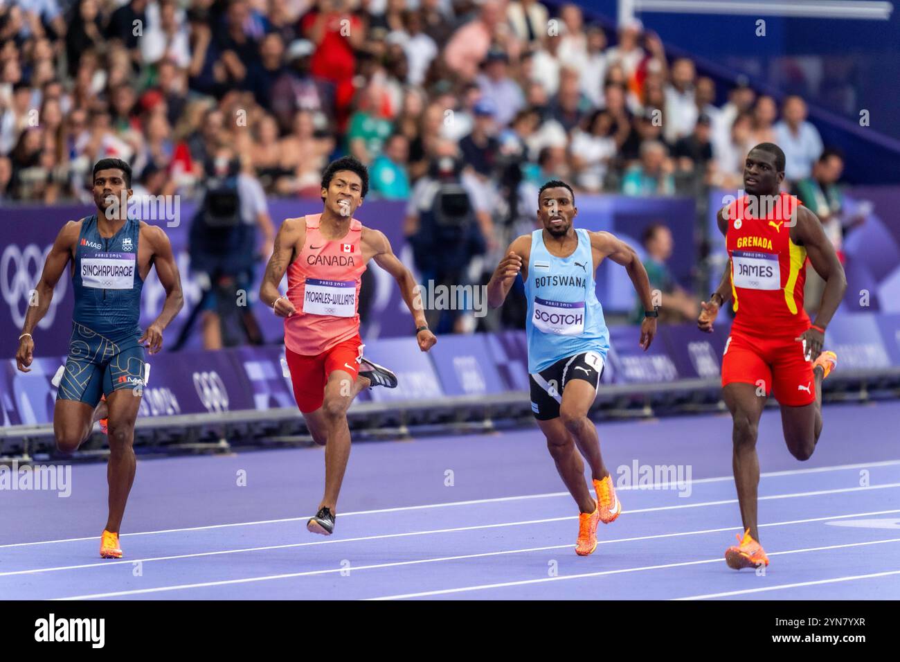Athletes competes in the Men's 400 meters heat at the 2024 Olympic ...