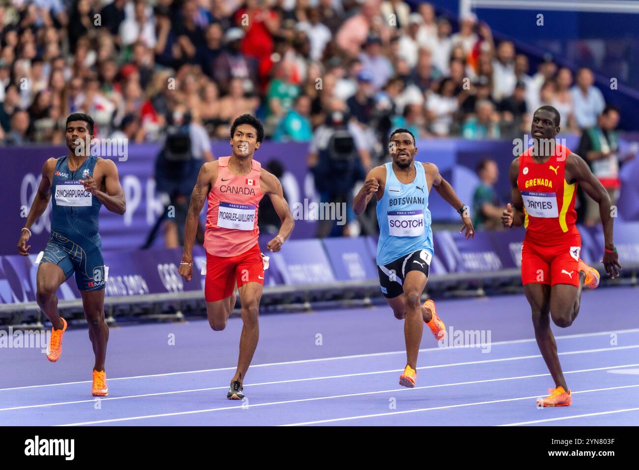 Athletes competes in the Men's 400 meters heat at the 2024 Olympic ...