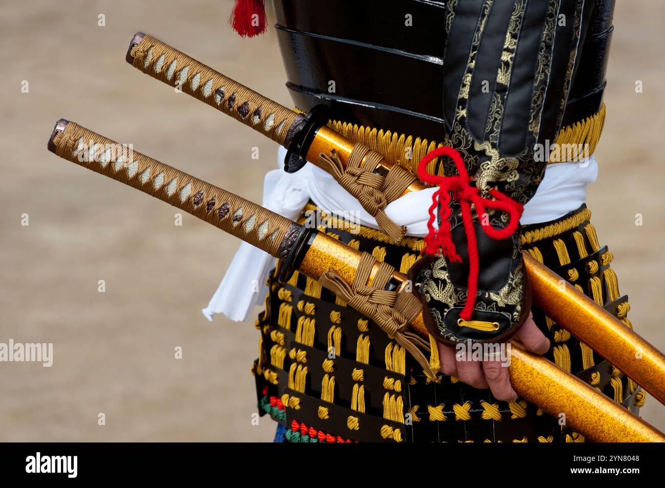 Samurai warrior holding a katana sword while in costume at the Hikone ...