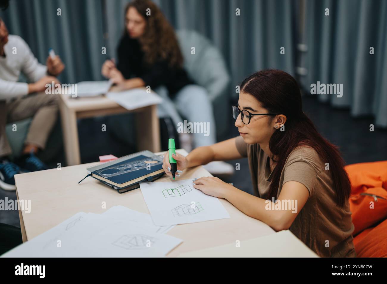 High school students collaborating in a classroom environment Stock ...