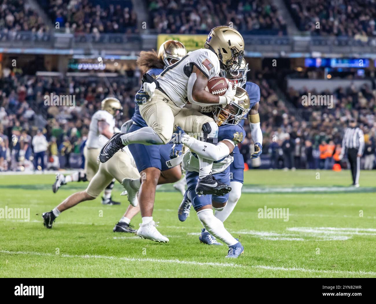 Bronx, New York, USA. 23rd Nov, 2024. The Army Black Knights TYRELL ROBINSON (21) leaps to try ...