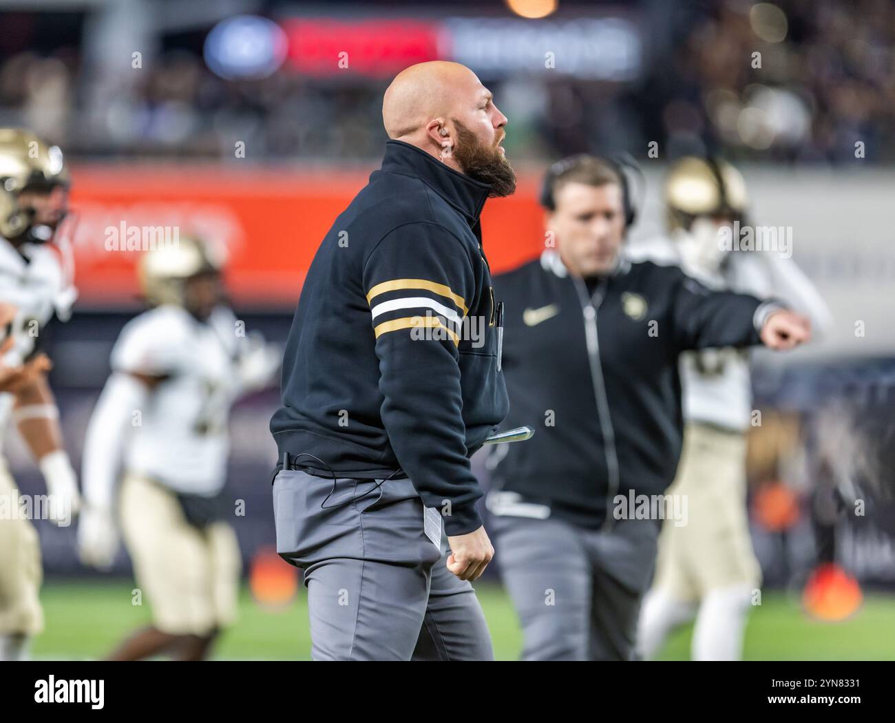 Bronx, New York, USA. 23rd Nov, 2024. Coaches on the sidelines ...