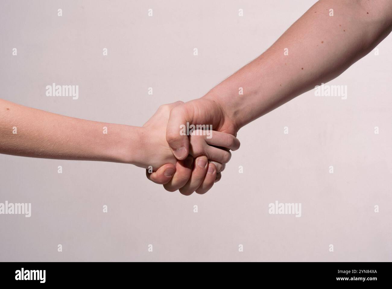 Holding hands. Handshake. Helping hand. Rescue gesture. Support hand. Concept of support. Strong ...