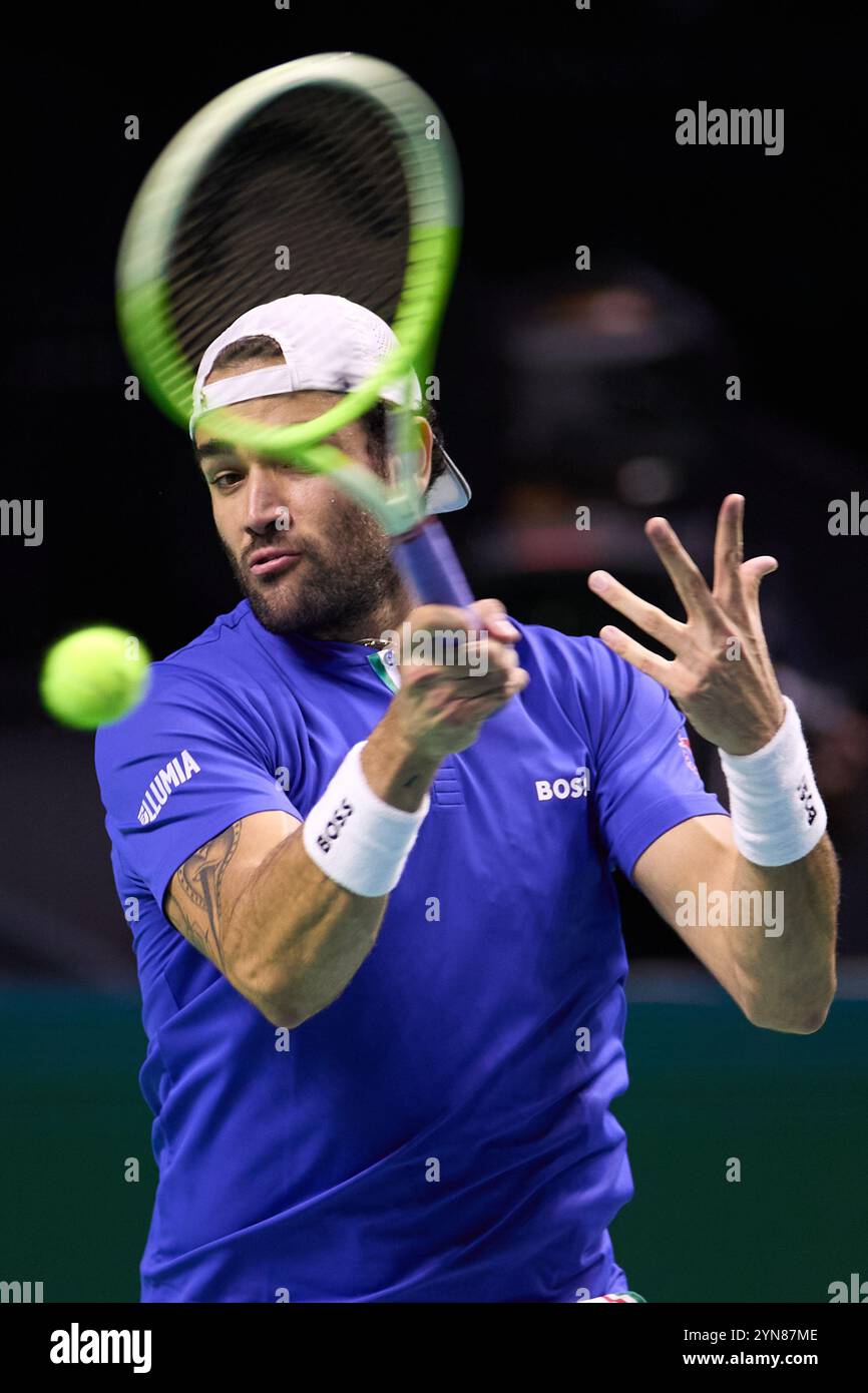 Malaga, Spain. 24th Nov, 2024. Matteo Berrettini of Italy returns a shot to Botic van de ...