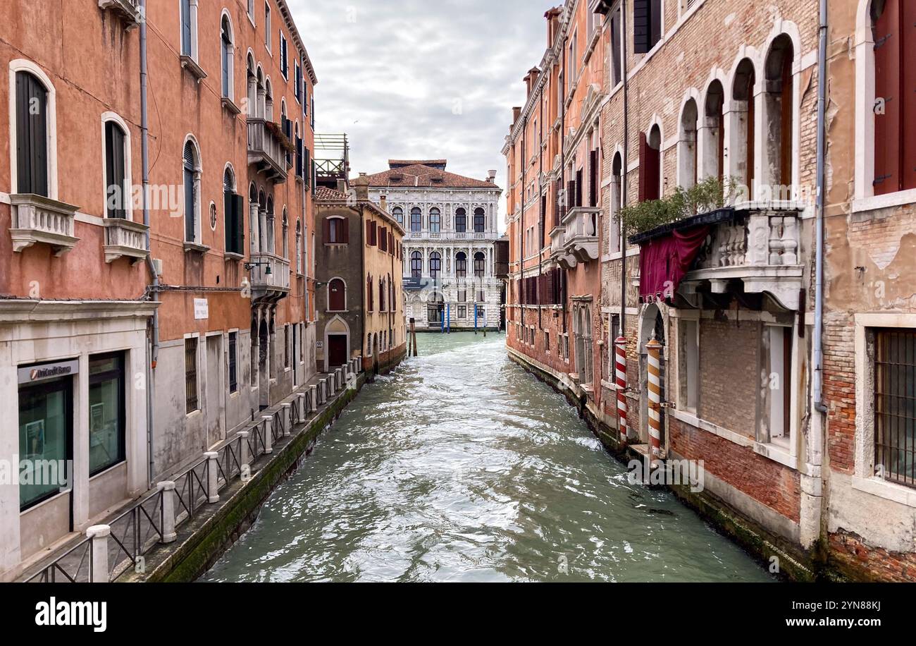 Horizontal real picture of narrow streets of Venice with old buildings ...