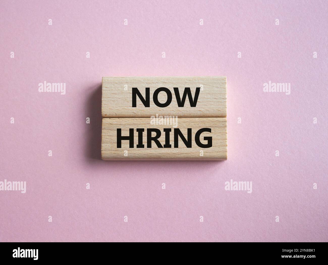 Now Hiring symbol. Concept word Now Hiring on wooden blocks. Beautiful ...